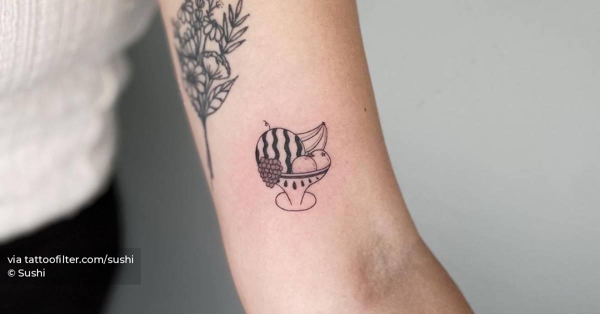 Still life tattoo located on the inner arm,