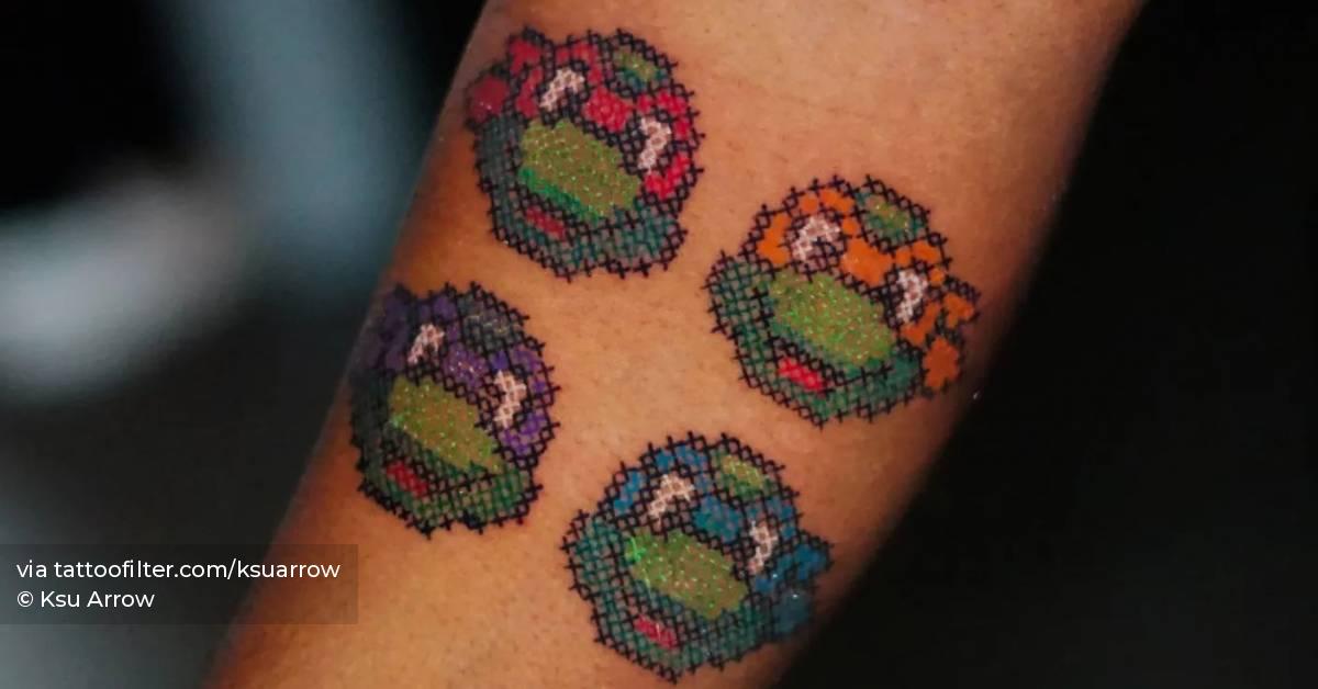 Teenage Mutant Ninja Turtles tattoo located on the