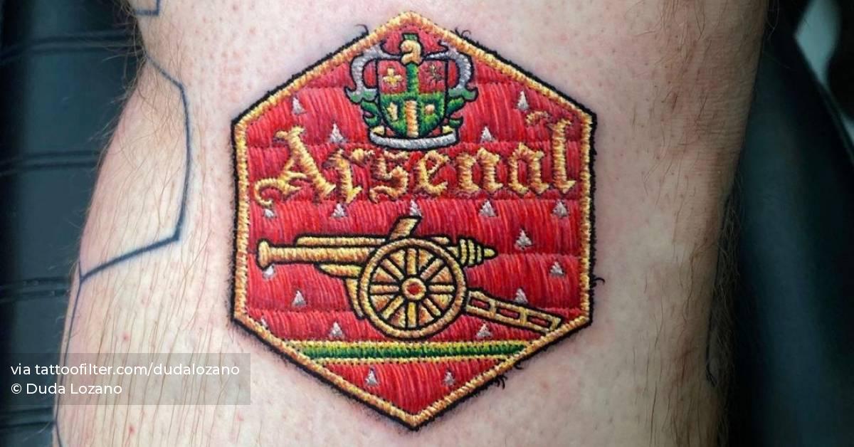 Arsenal FC patch tattoo located on the knee.