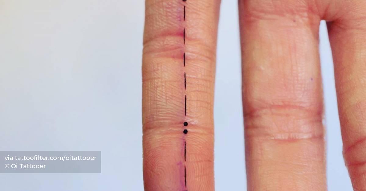 Morse code tattoo done on the finger.