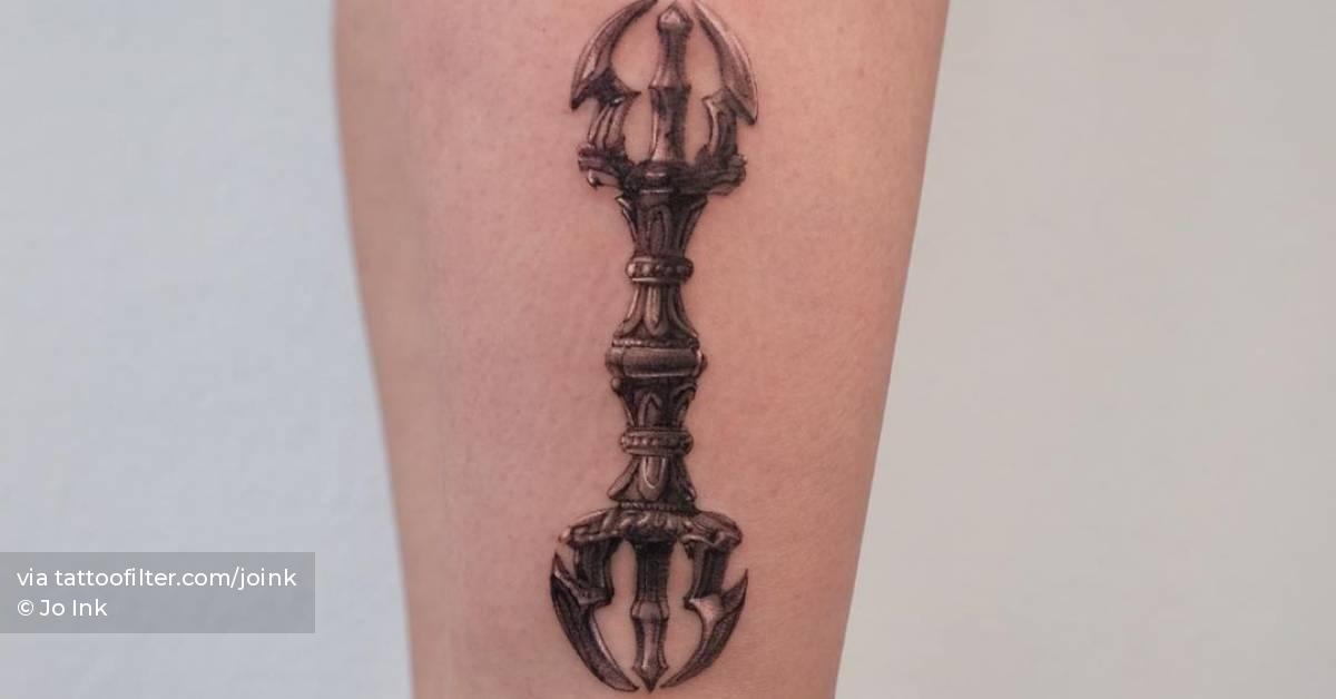 Vajra tattoo located on the shin, micro-realistic