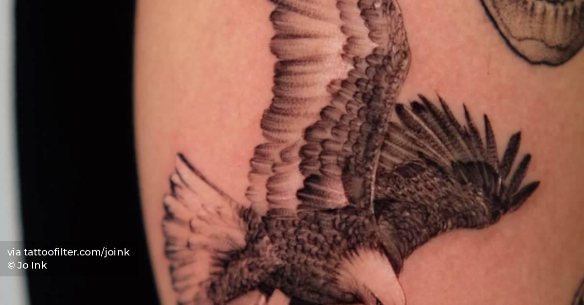 Tattoo of a micro-realistic eagle placed on the upper