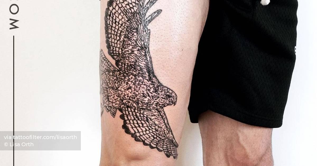 Hawk tattoo located on the thigh, engraving style.