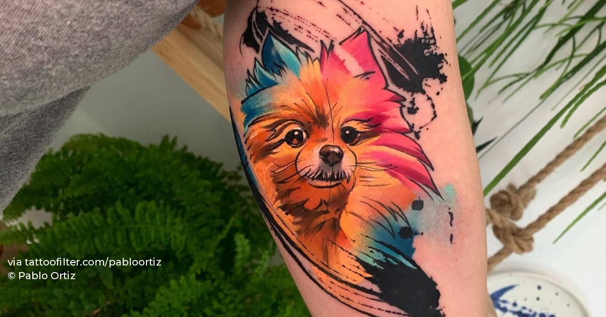 Pomeranian portrait tattoo located on the inner arm.