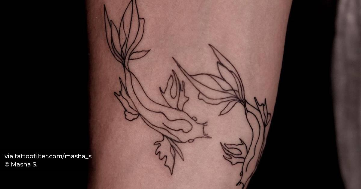 Fine line koi fish tattooed on the inner forearm.