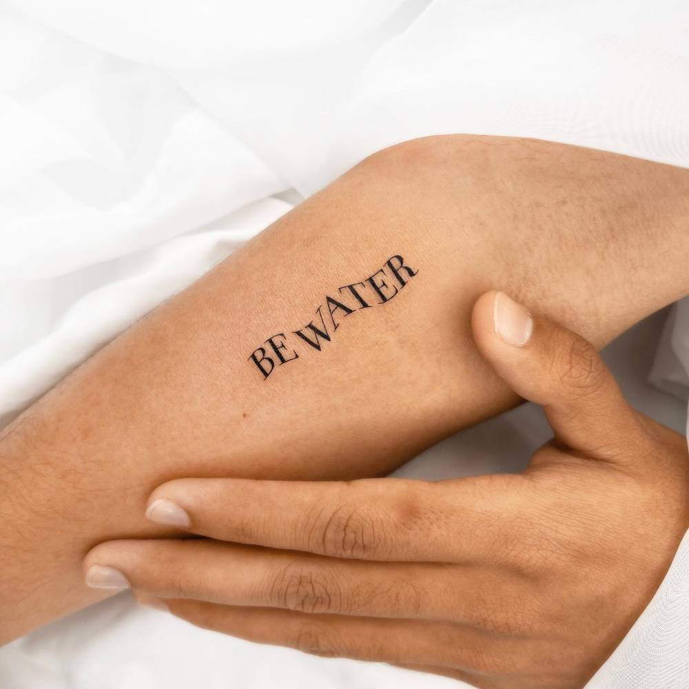 Be Water Lettering Tattoo Located On The Inner Be Water Lettering Tattoo Located On The Inner