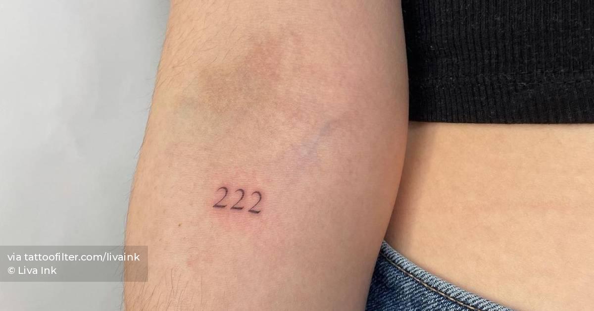 Tattoo of the number "222" placed on the inner forearm.