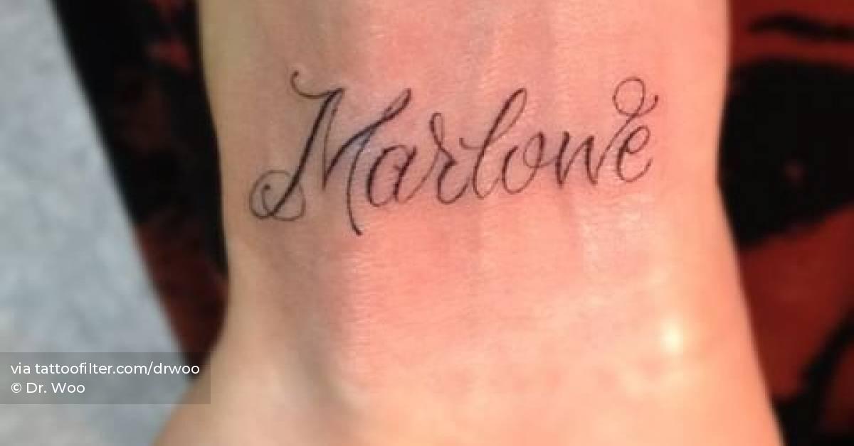 Tattoo of the name "Marlowe" done on the wrist.
