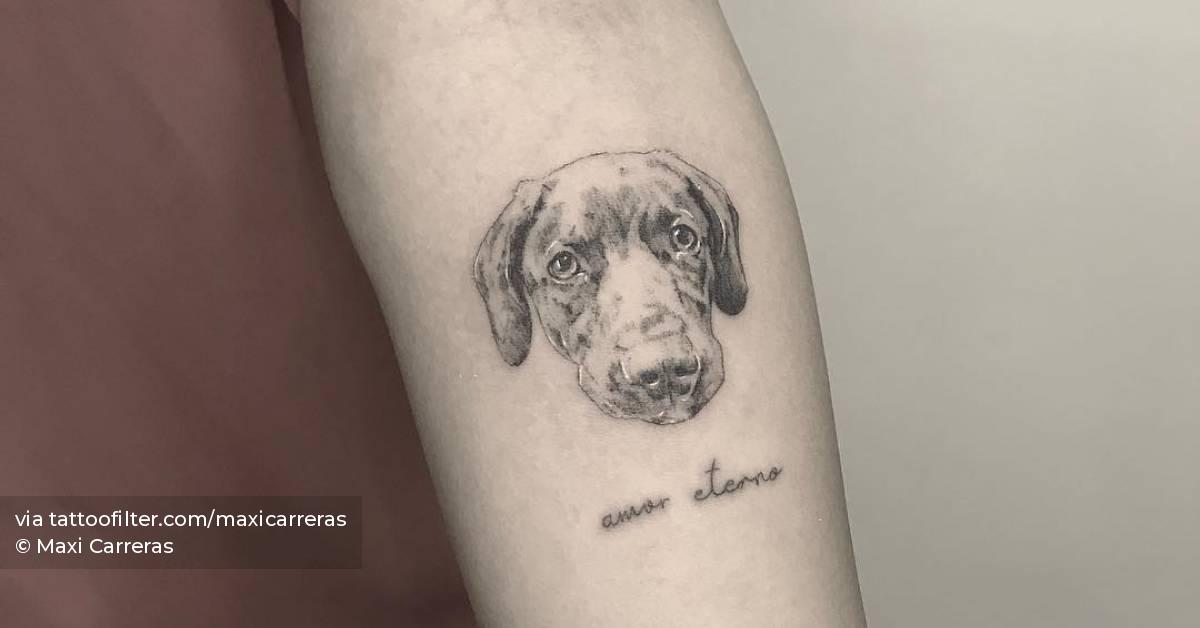 Micro-realistic labrador portrait tattoo on the inner