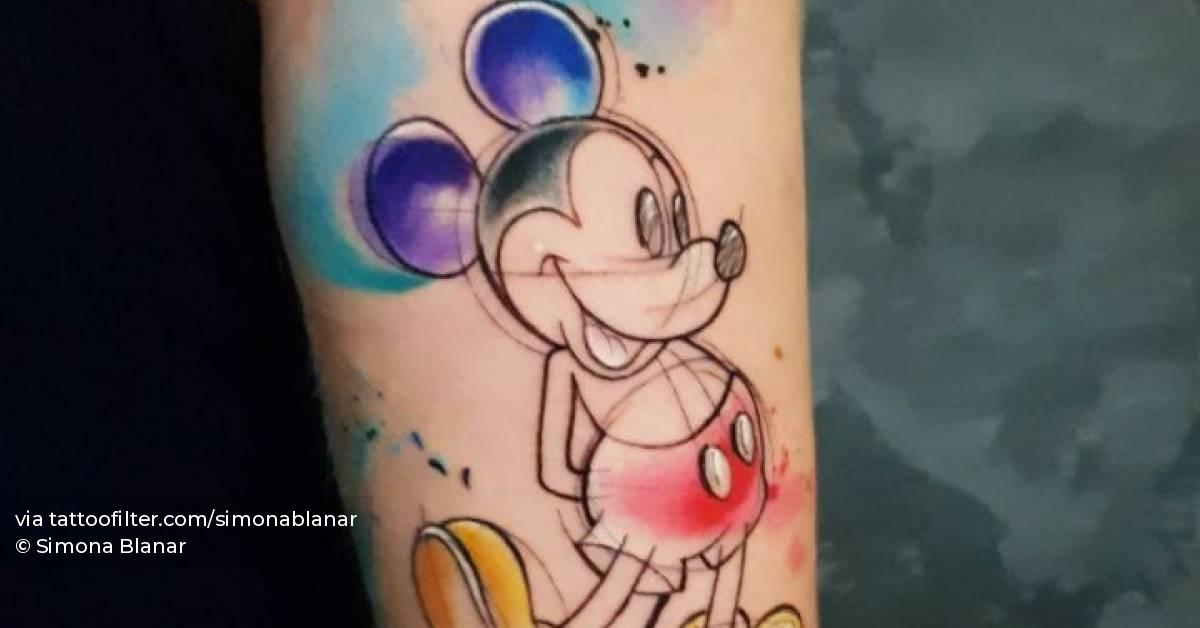 Mickey Mouse tattoo done on the tricep, watercolor