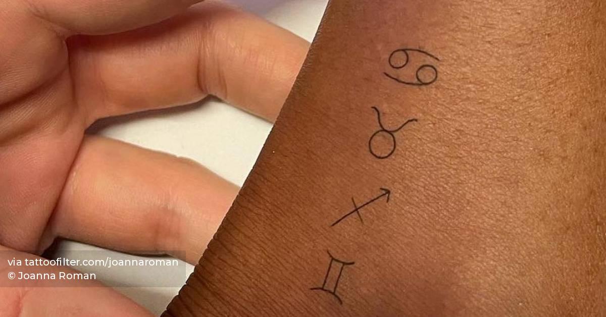 Minimalist Zodiac symbols tattooed on the ankle.