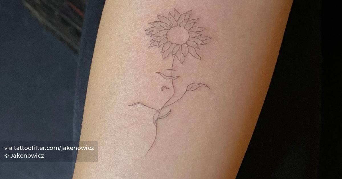Single needle face and sunflower tattoo done on the