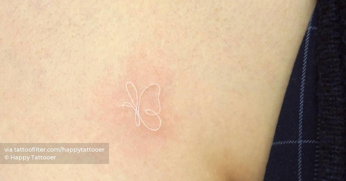 One line minimalistic butterfly tattoo located on the