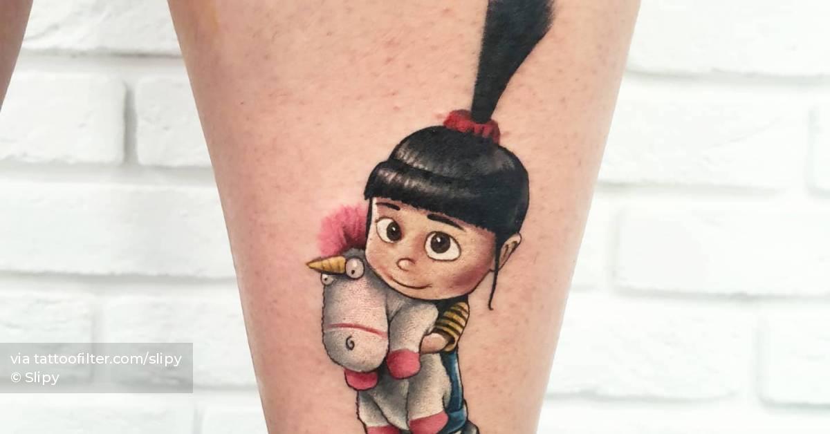 Boo tattoo located on the achilles, cartoon style.