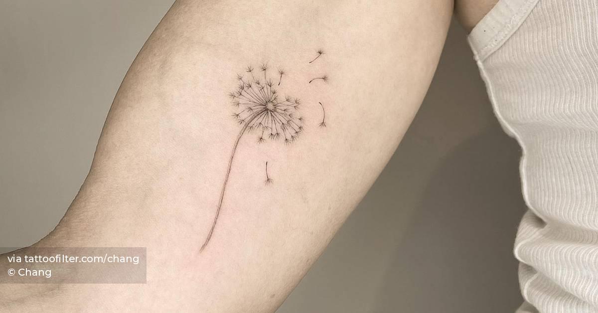 Dandelion seed tattoo located on the inner arm, fine