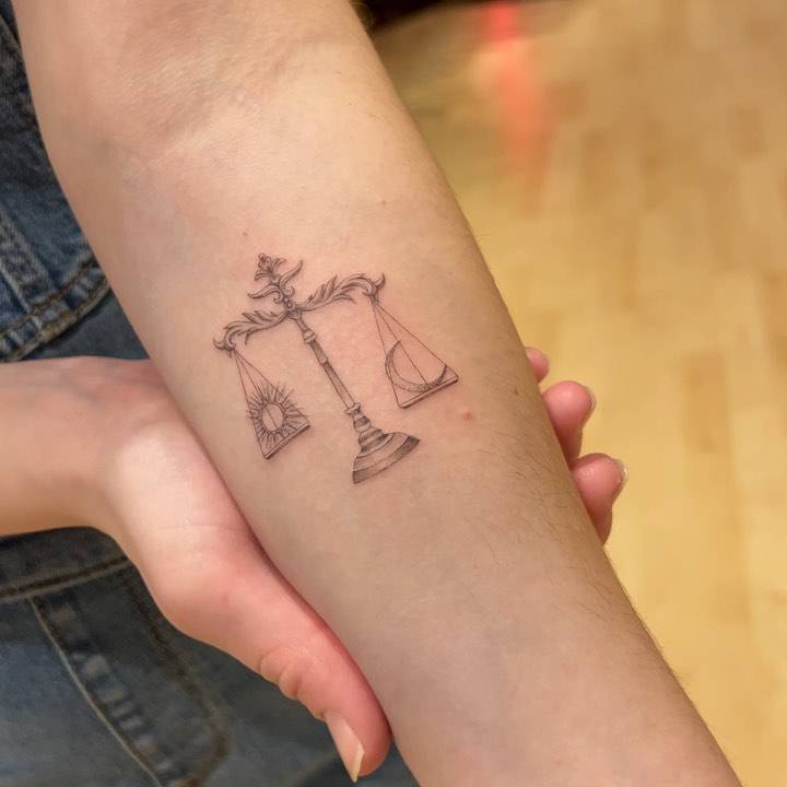 Scale Tattoo Located On The Inner Forearm Scale Tattoo Located On The Inner Forearm