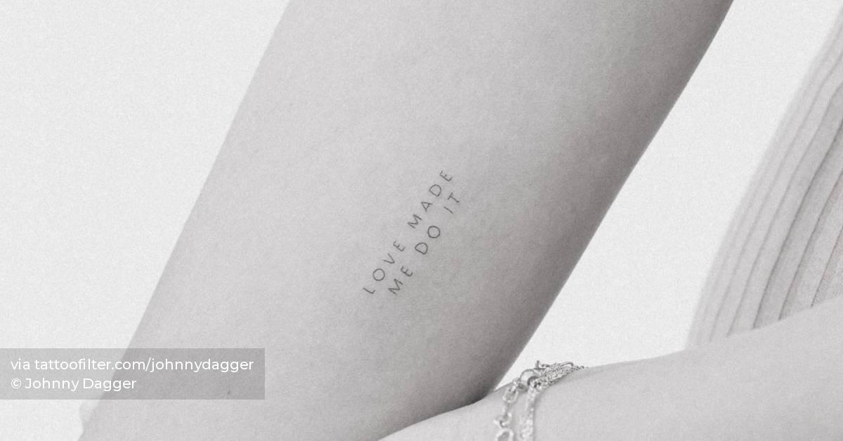 "Love made me do it" lettering tattoo handwritten on