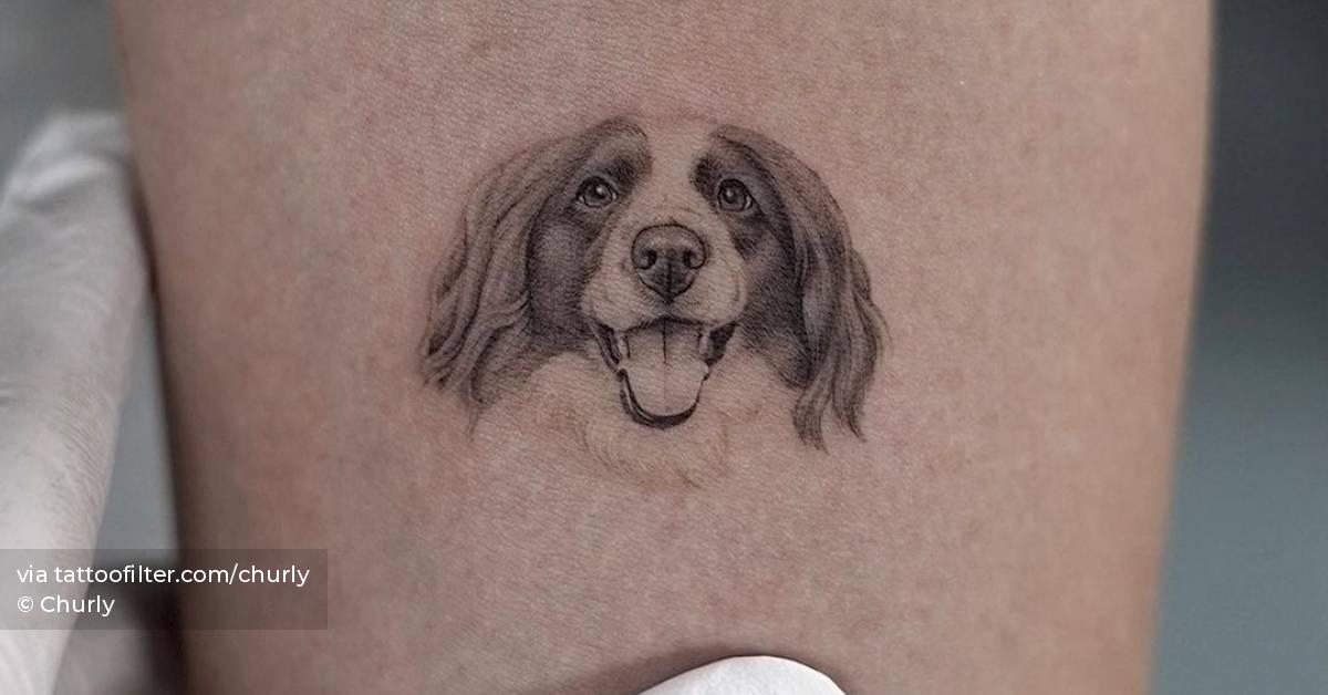 Cocker Spaniel portrait tattoo placed on the inner