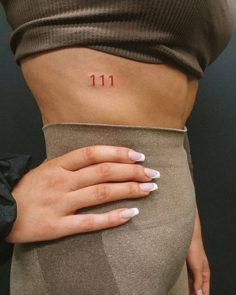 Angel Number 111 Tattooed On The Rib Done In Red