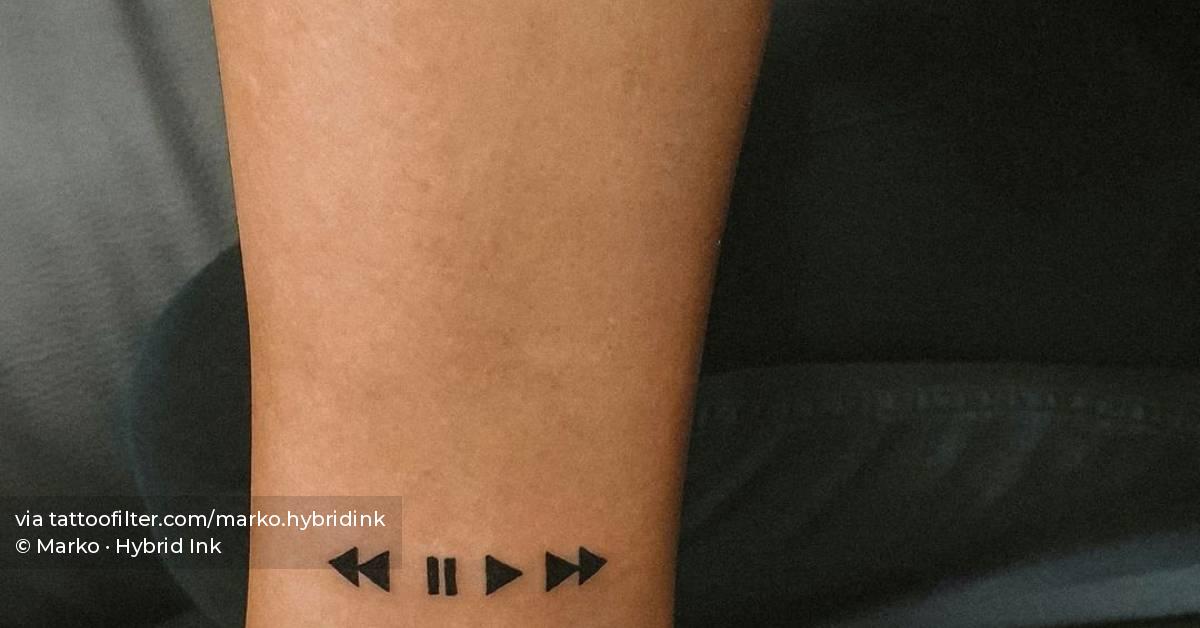 Minimalistic style media controls tattoo located on the