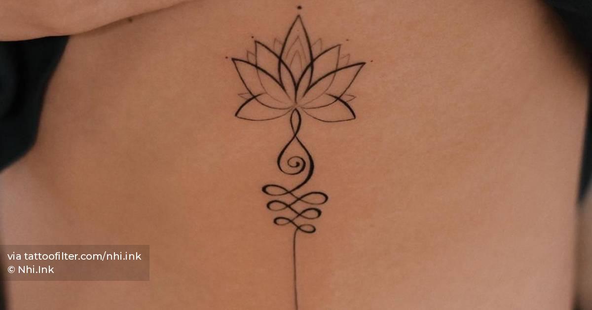 Lotus ulanome tattoo located on the rib.