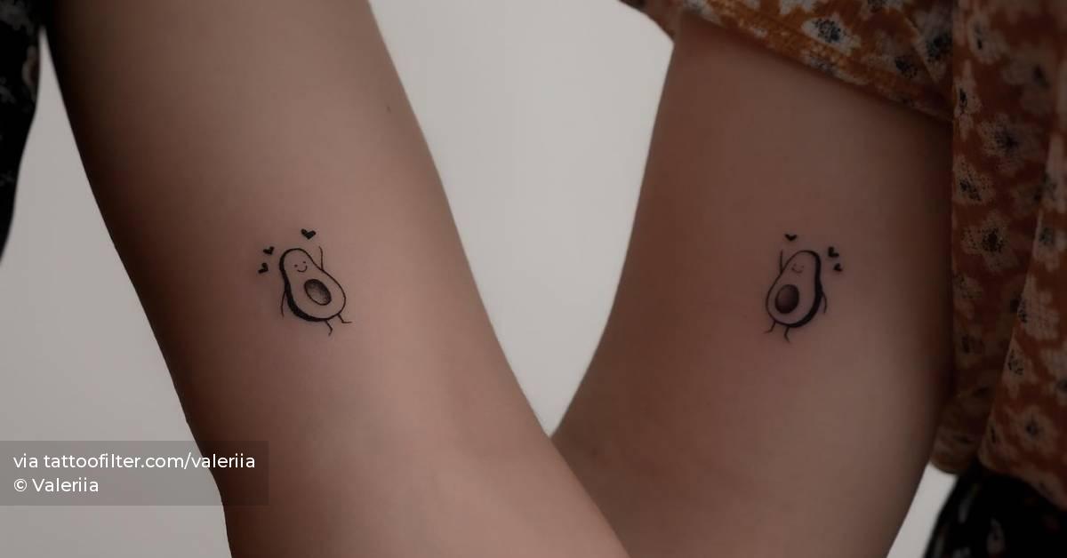 Matching avocados tattooed on best friends.