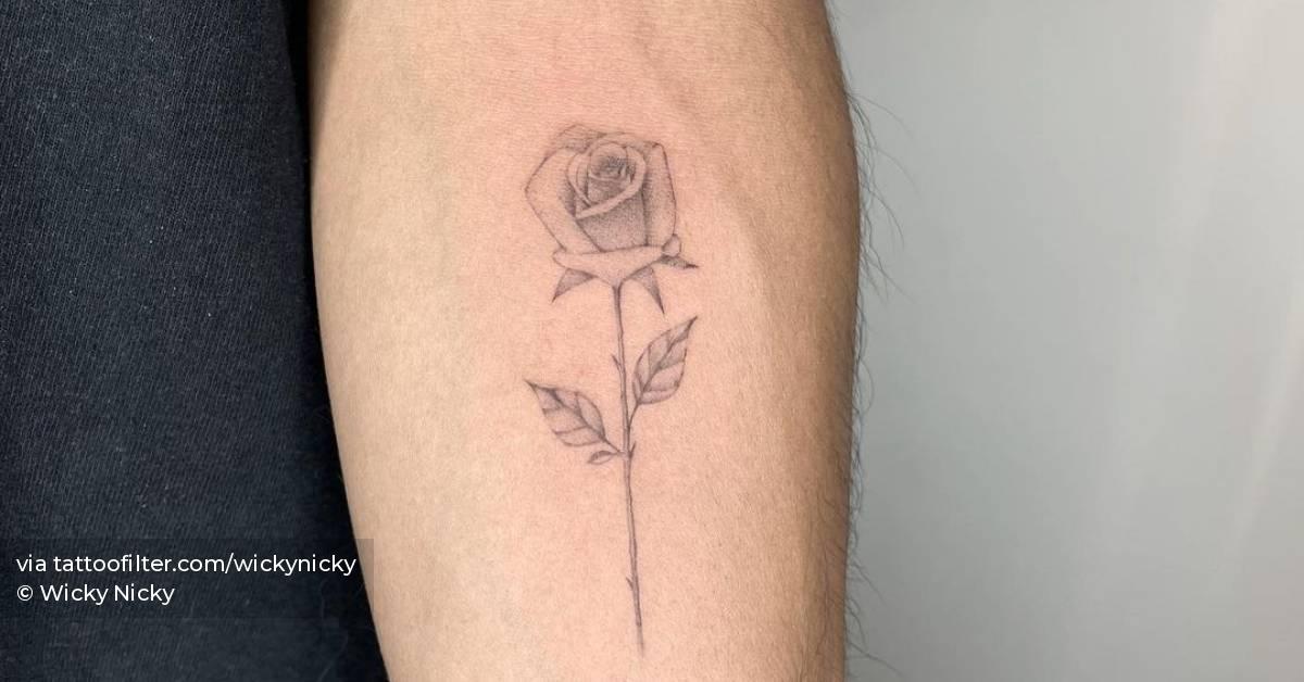 Micro-realistic style rose tattoo done on the inner