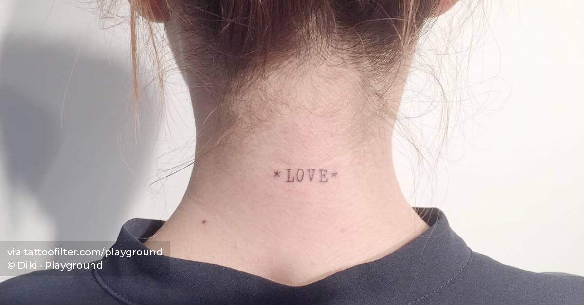Tattoo of the word "love" located on the back of the