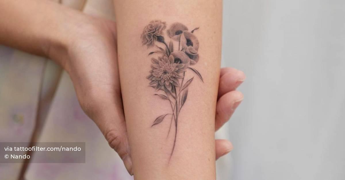 Micro-realistic flower bouquet tattoo located on the