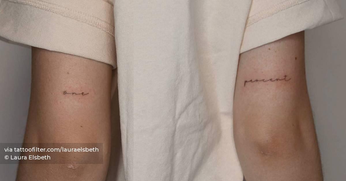 "One percent" individual matching tattoo located on the
