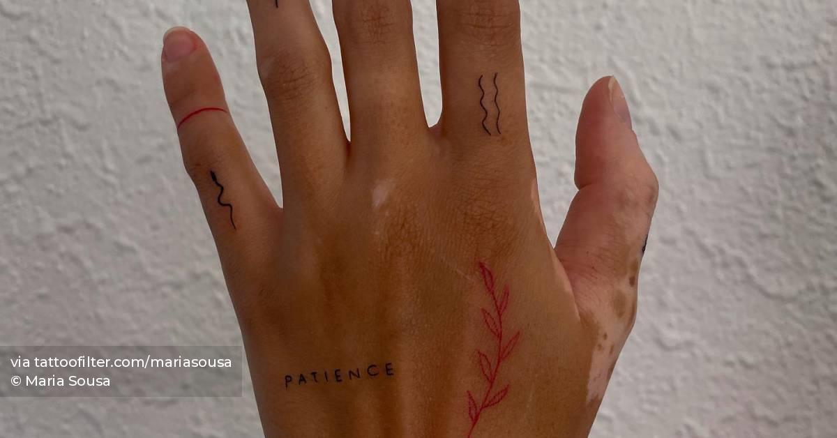 Minimalistic hand tats.