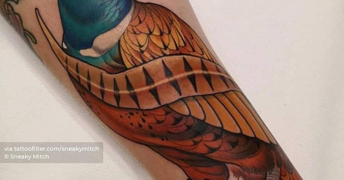 Neotraditional style pheasant tattoo located on the