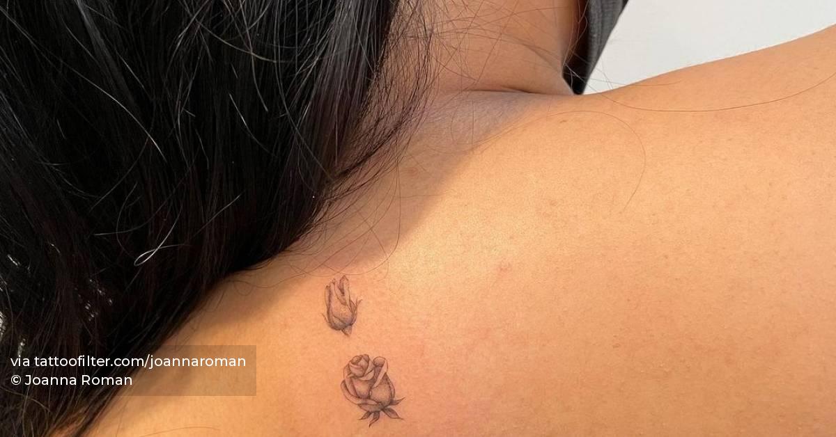 Micro-realistic style blooming rose tattoo located on