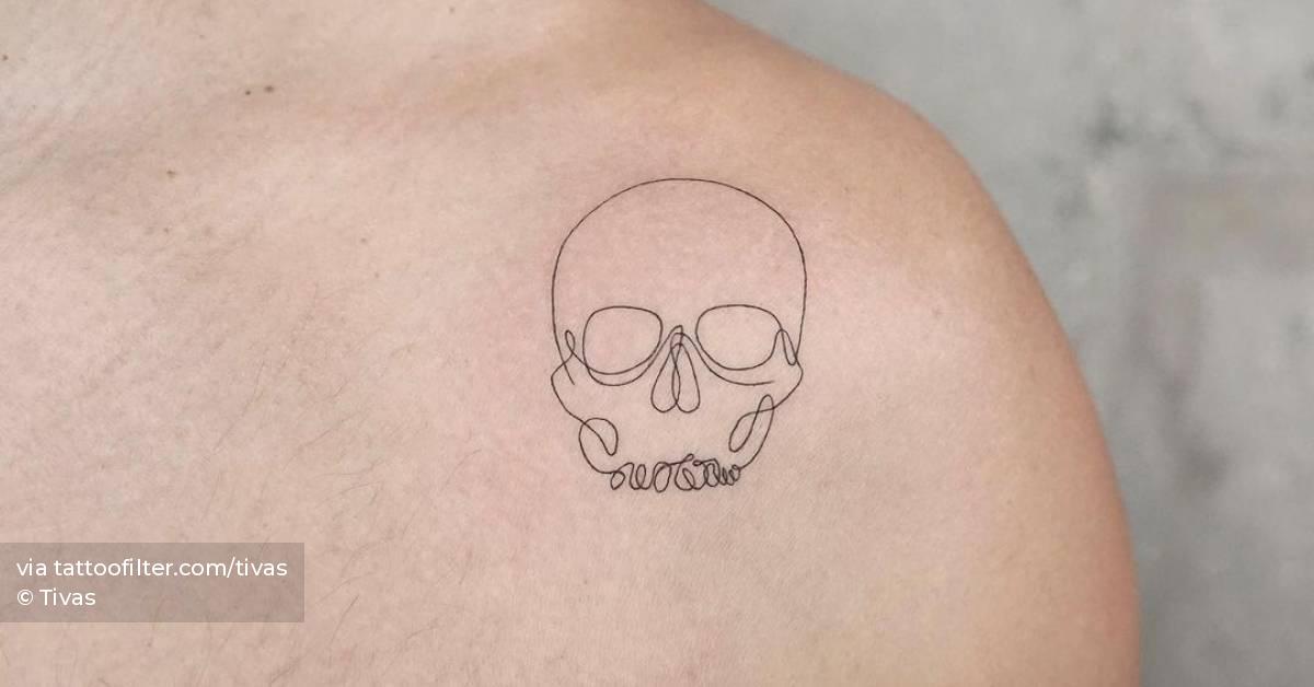 One line skull tattoo done on the shoulder.