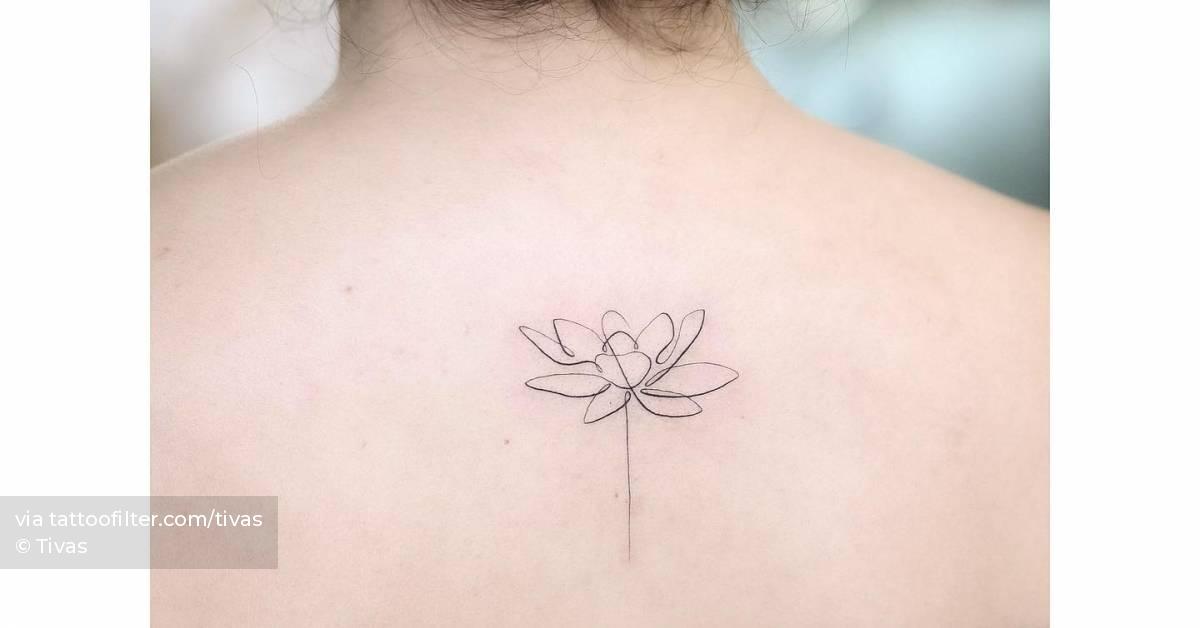 One line water lily tattoo located on the upper back.