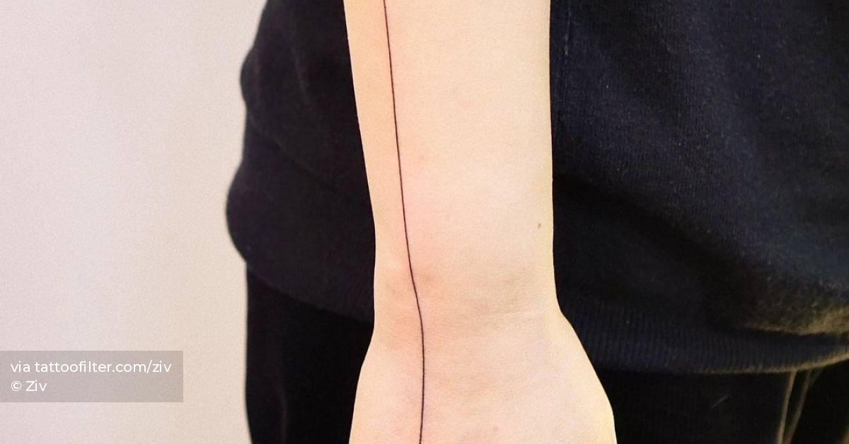 Simple line tattoo on the forearm and hand