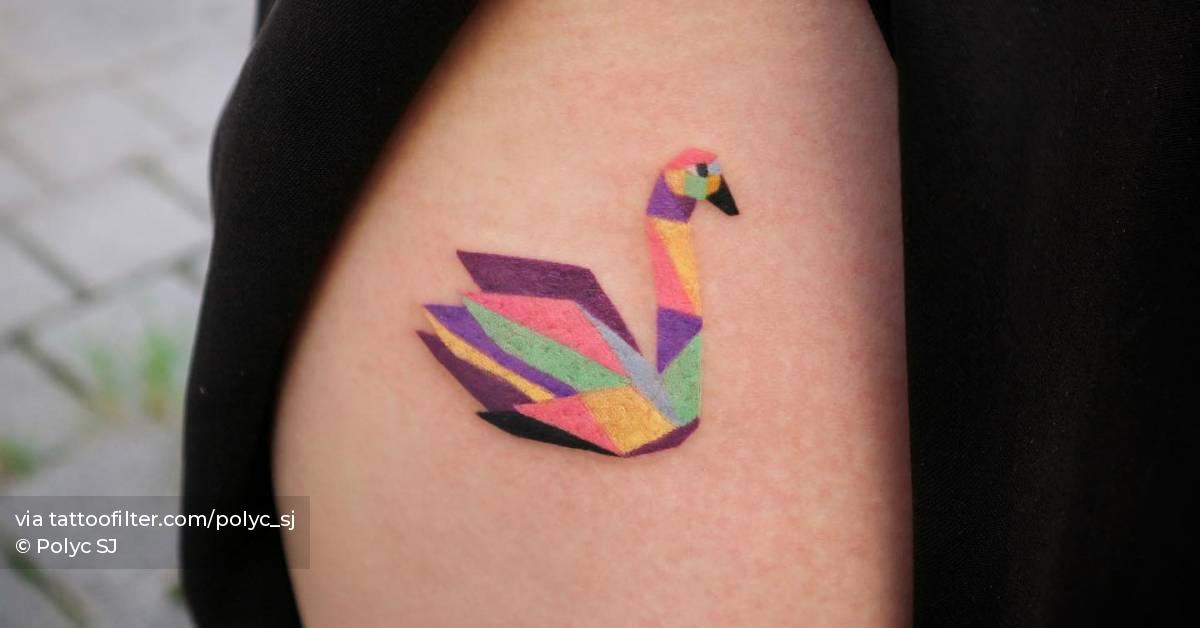 Low Poly swan tattoo located on the thigh.
