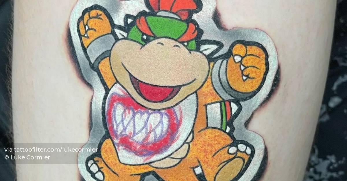 Bowser Jr. sticker tattoo located on the thigh.