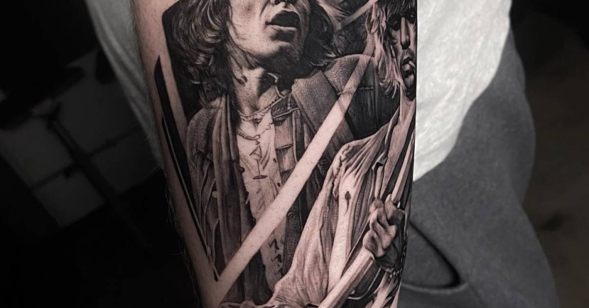 Micro-realistic Mick Jagger tattoo located on the