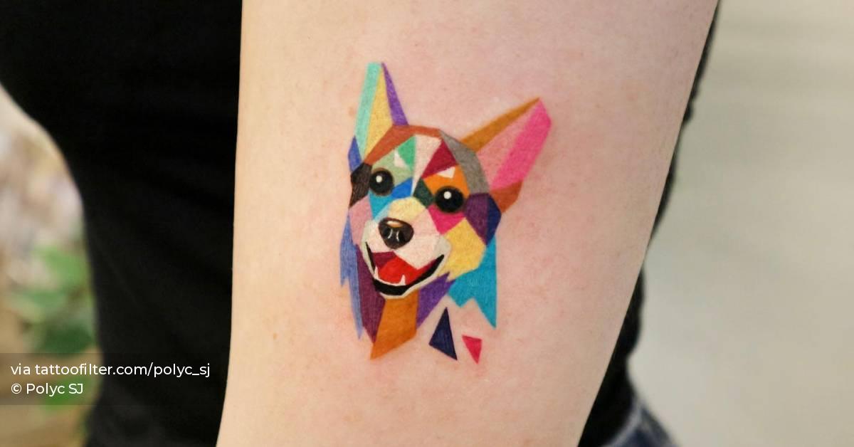 Low poly Corgi portrait tattoo located on the upper