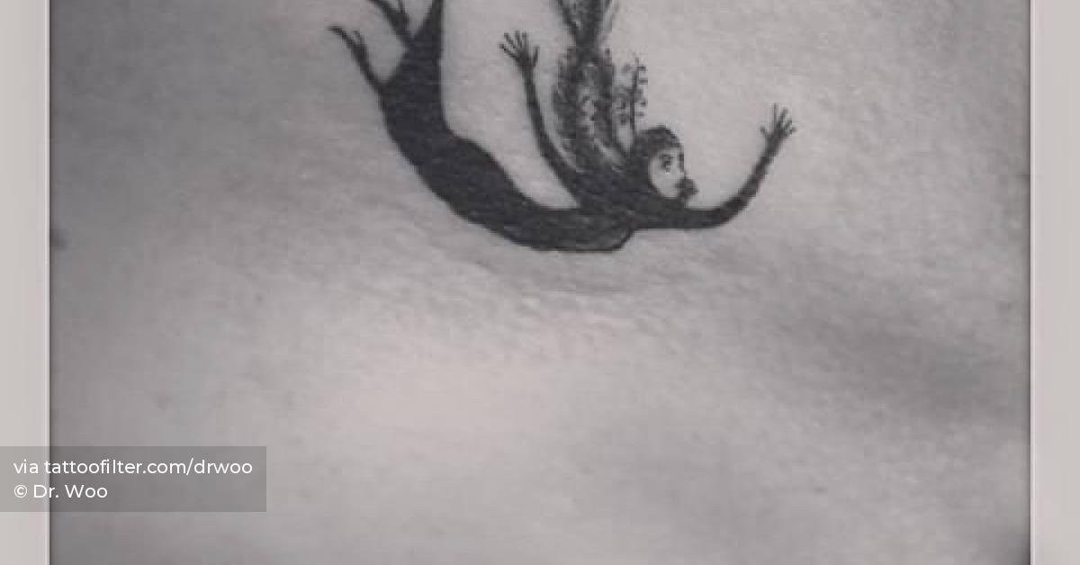 Mini Gorey's artwork tattooed on the rib.