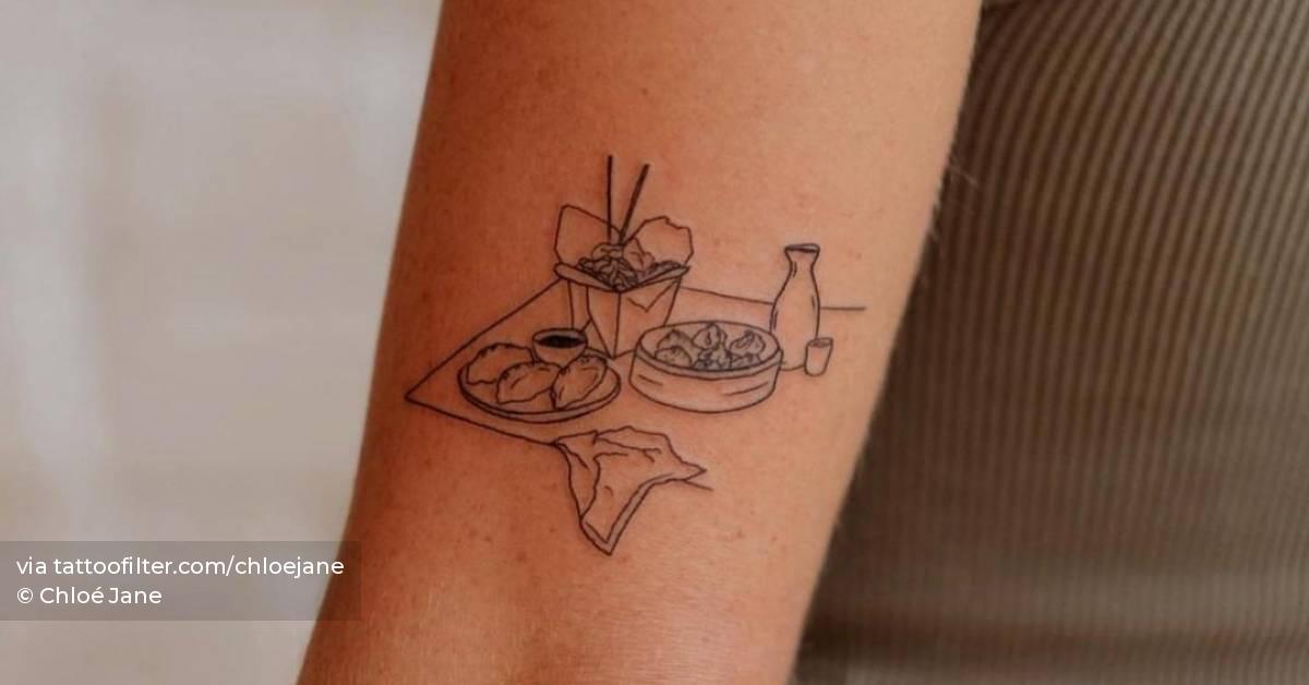 Fine line style food inspired tattoo located on the