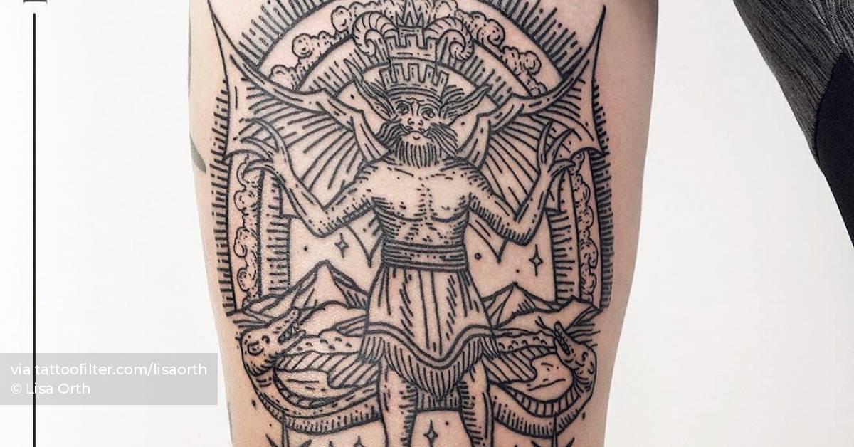 Dark esoteric themed tattoo located on the thigh.