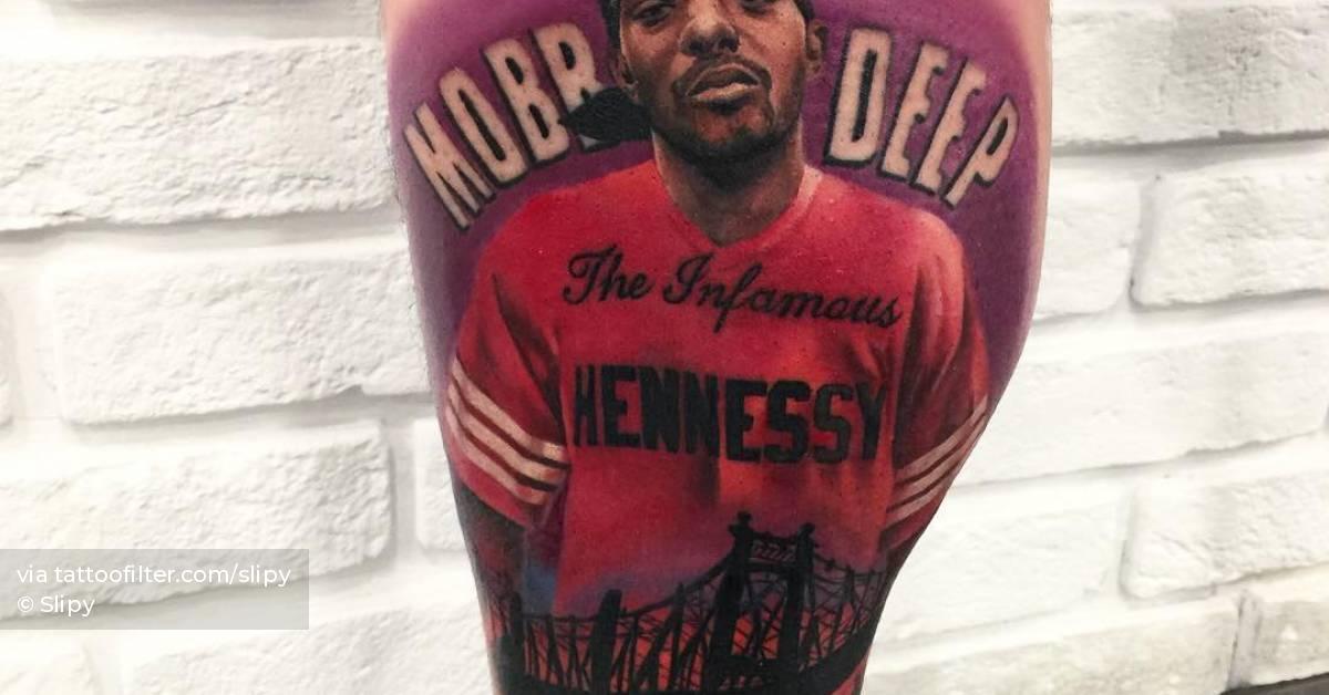 Prodigy of MOBB DEEP tattooed on the shin, realistic