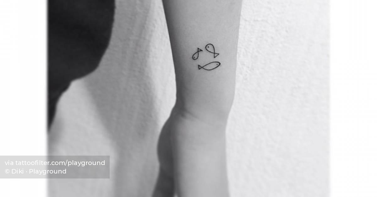Minimalistic style fish tattoo done on the wrist.