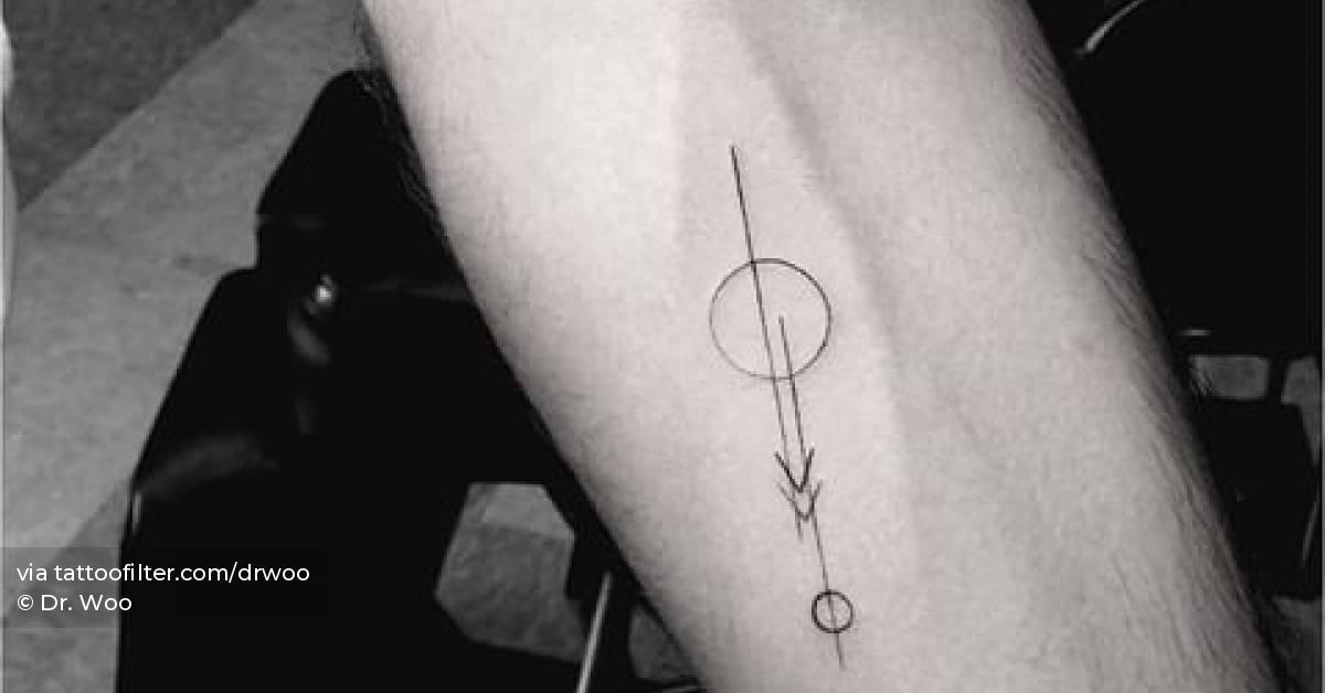 Fine line geometric shapes tattooed on the inner