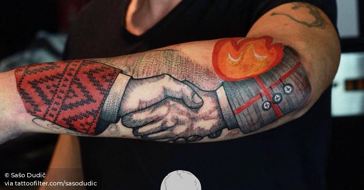 illustrative style handshake on the left forearm.