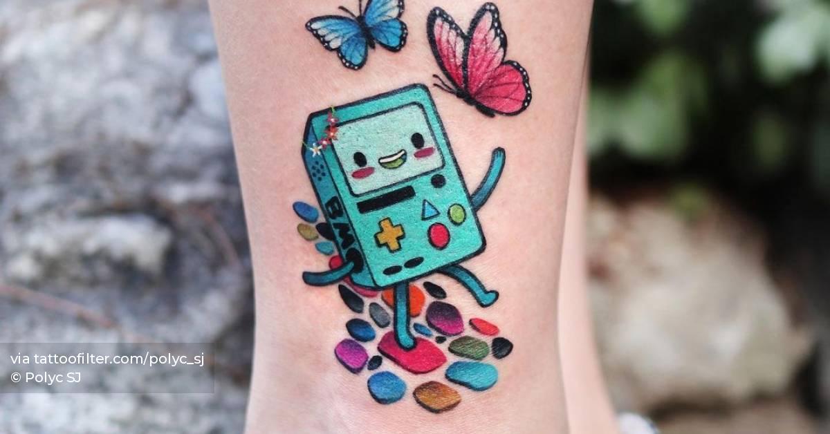 BMO tattoo located on the ankle, cartoon style.