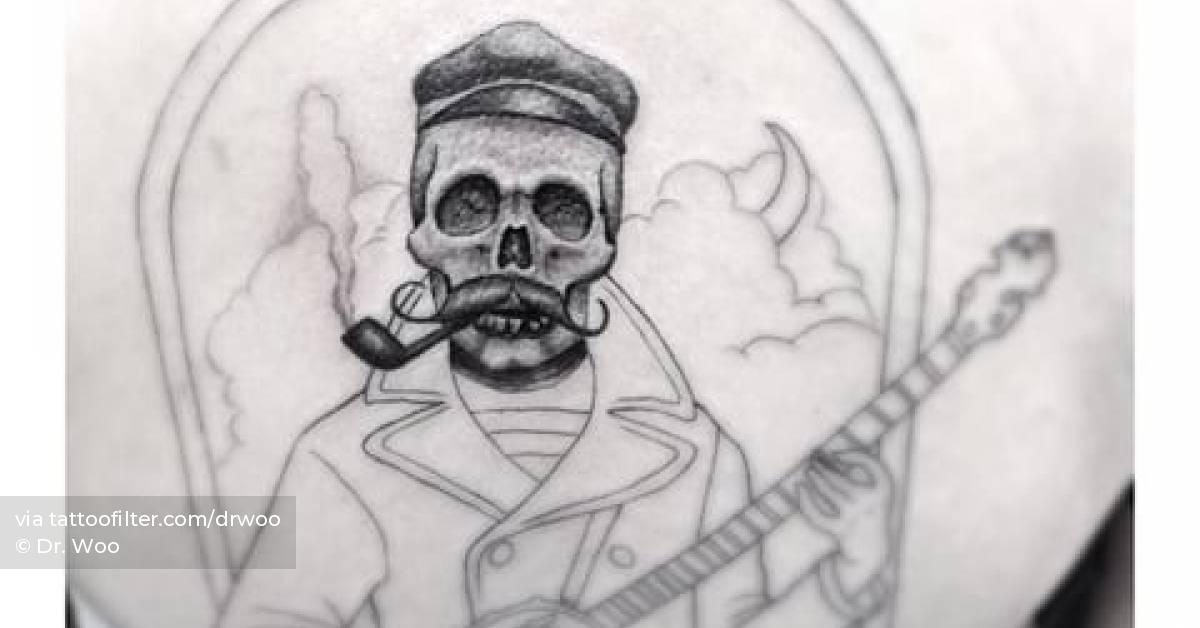 Derek Nobbs art piece tattooed on the back.