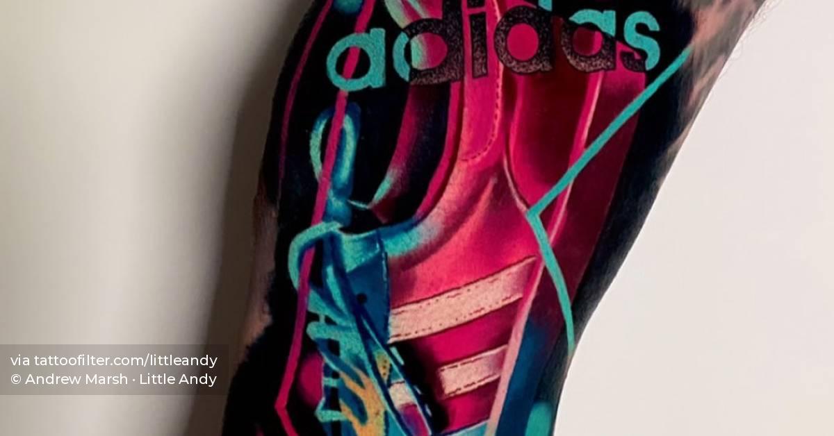Adidas themed leg tattoo.